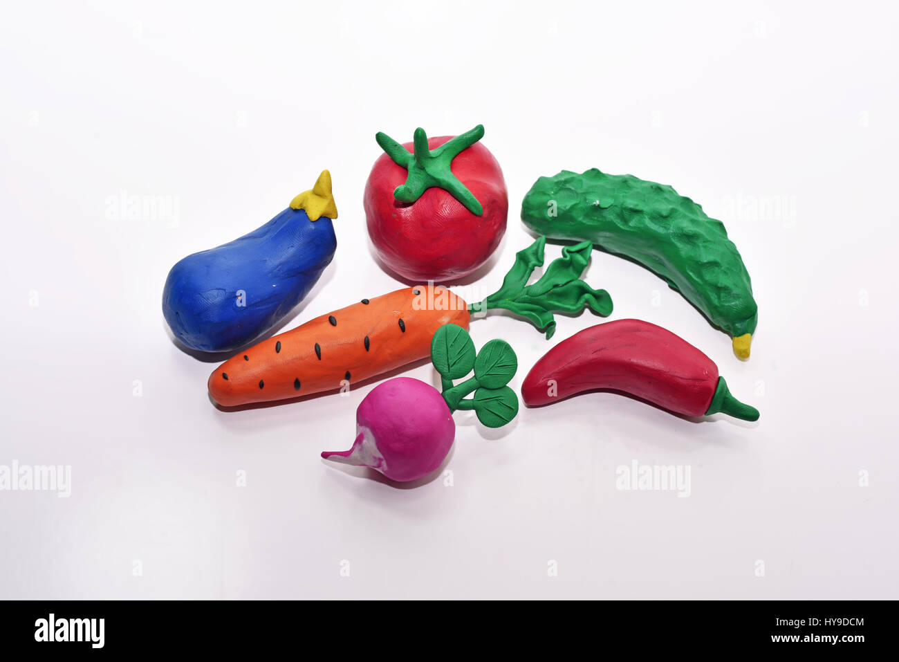 Vegetables made from plasticine. Isolated on white background Stock ...