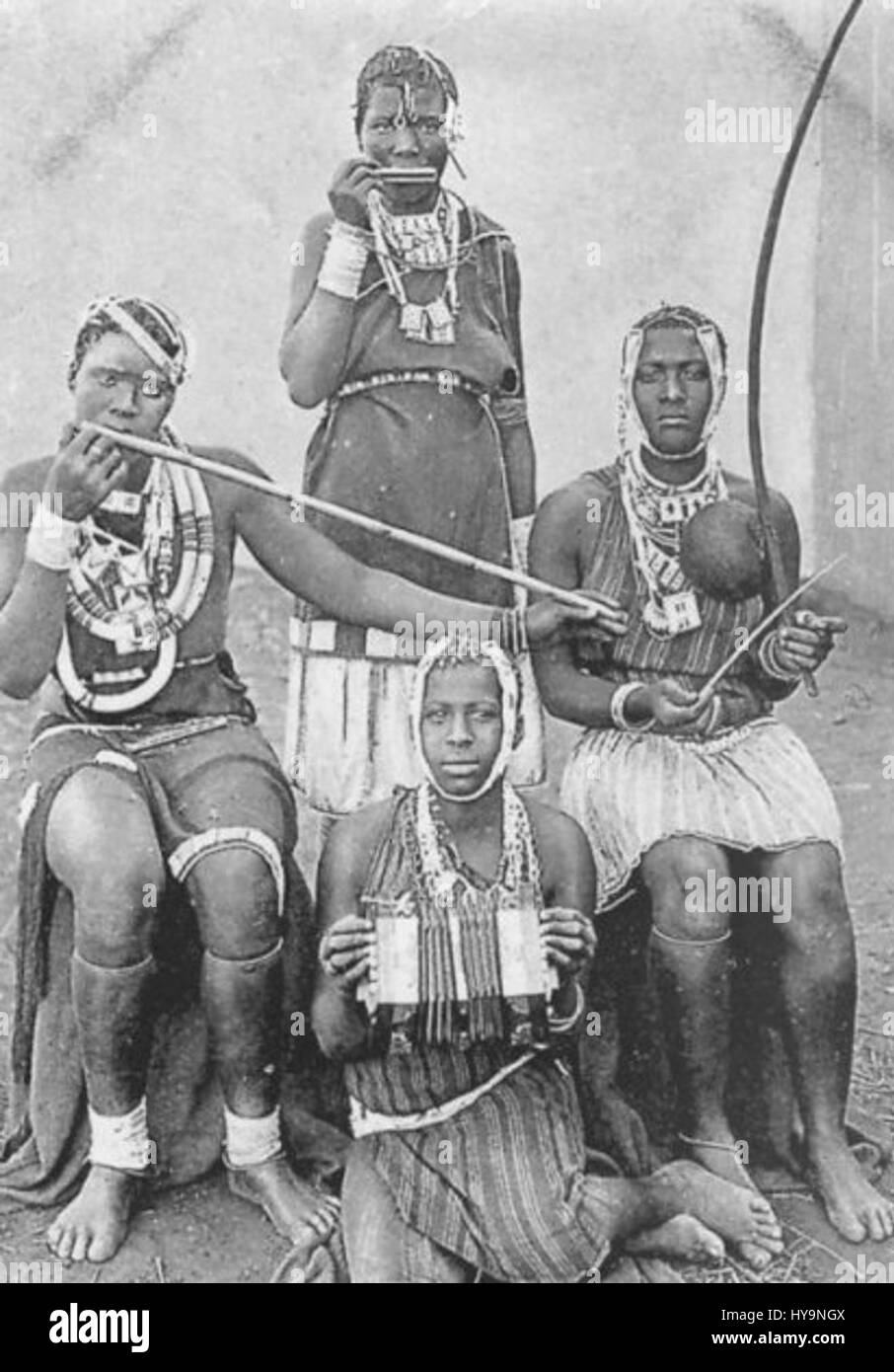 This historical photograph from around 1900 captures Zulu musicians ...