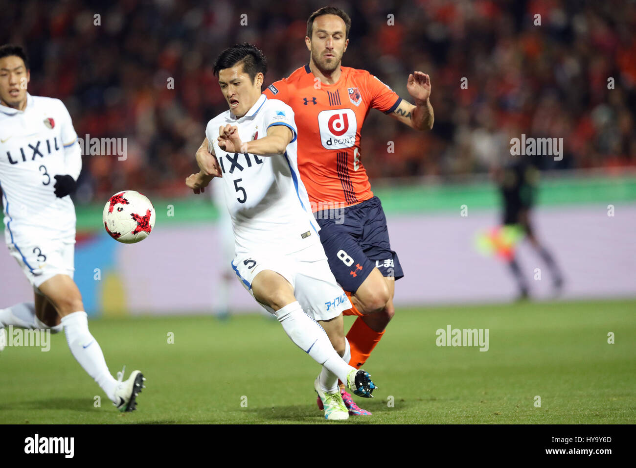 Saitama, Japan. 1st Apr, 2017. (L to R) Naomichi Ueda (Antlers), Dragan Mrdja (Ardija) Football ...