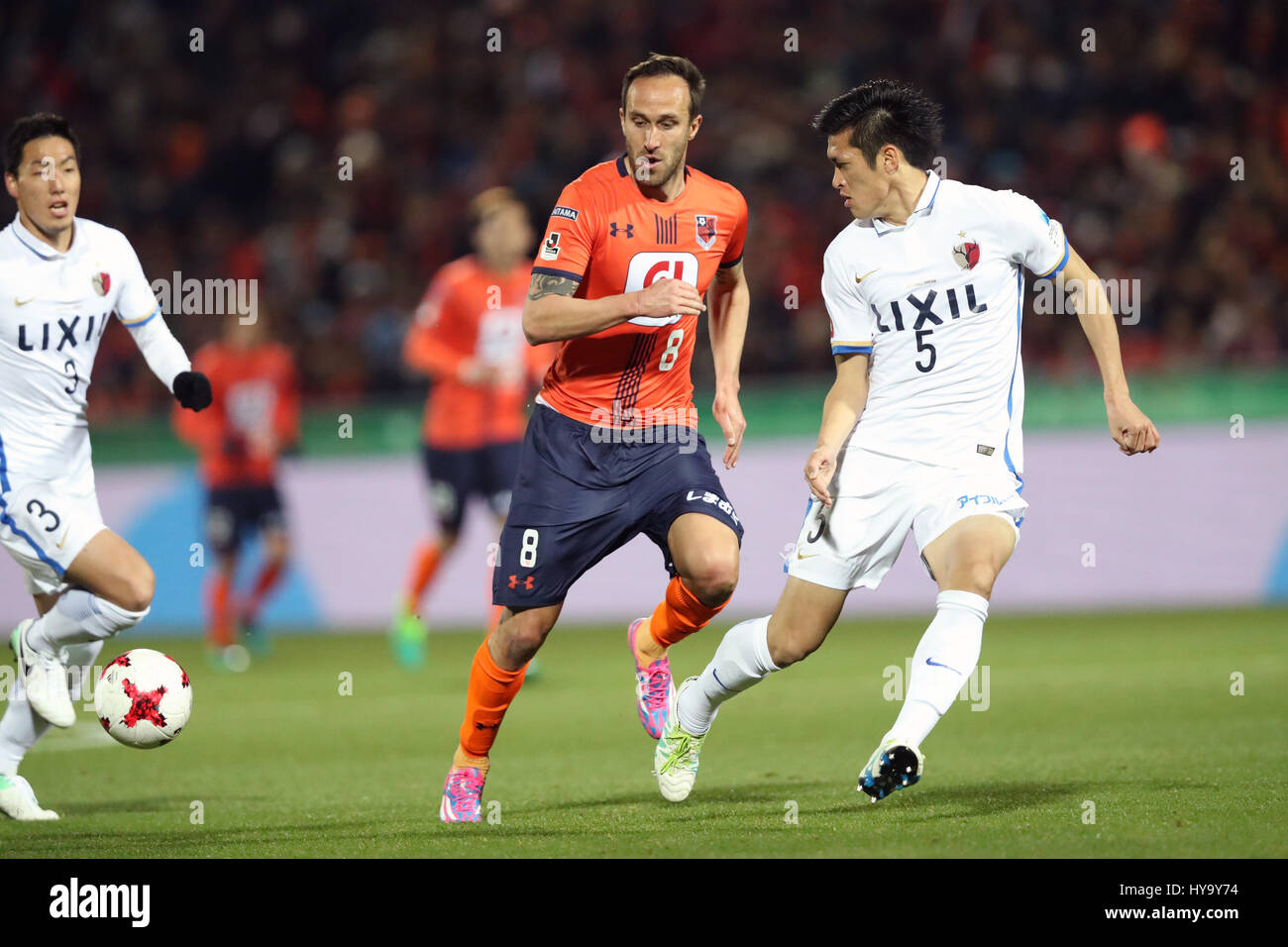 Saitama, Japan. 1st Apr, 2017. (L to R) Dragan Mrdja (Ardija), Naomichi Ueda (Antlers) Football ...