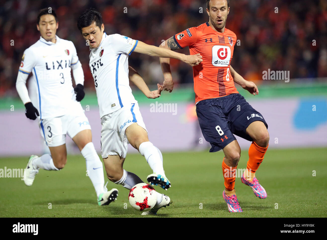 Saitama, Japan. 1st Apr, 2017. (L to R) Naomichi Ueda (Antlers), Dragan Mrdja (Ardija) Football ...