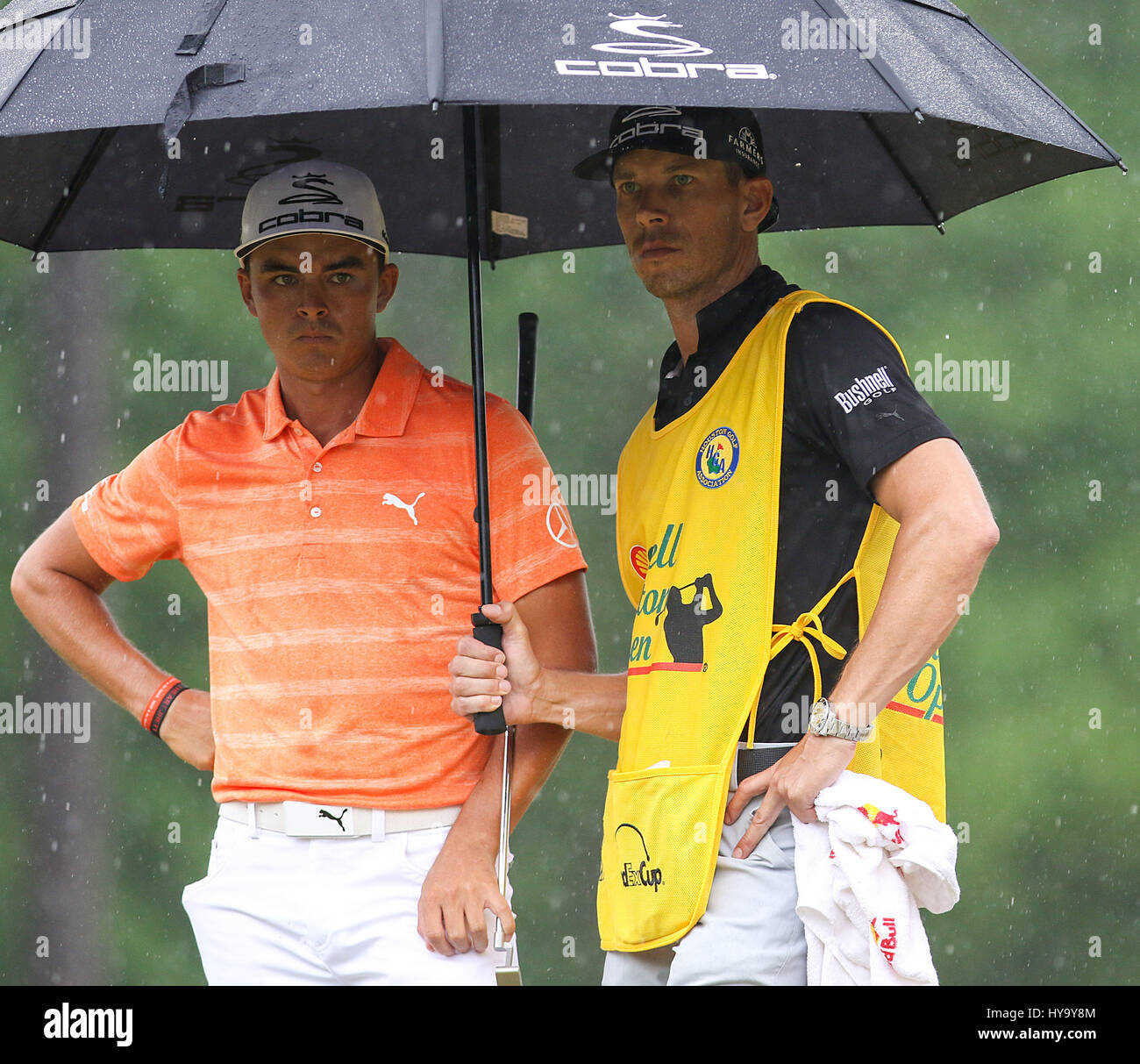 Humble, Texas, USA. 2nd Apr, 2017. Rickie Fowler and his caddie look on ...