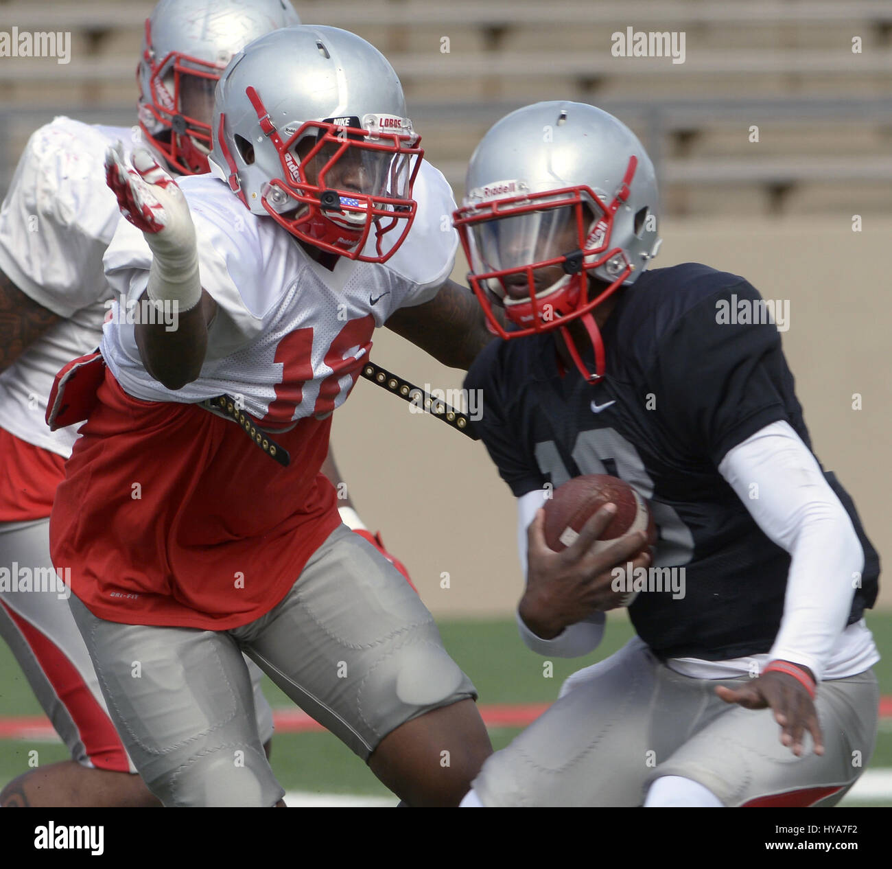 Usa. 3rd Apr, 2017. SPORTS -- UNM's Everett Powell, left, chases ...