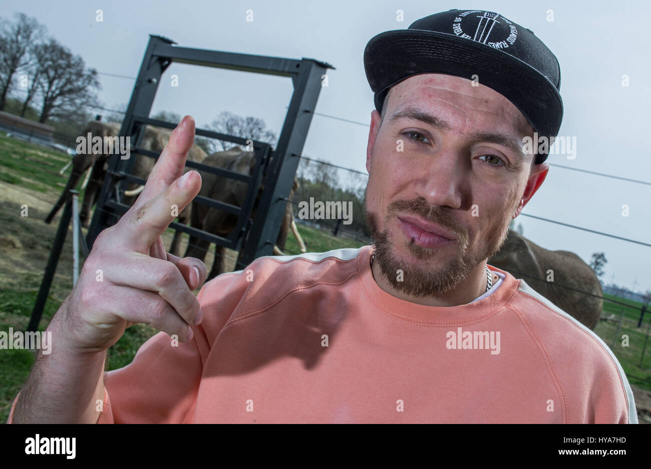 German rapper Liquit Walker from Berlin seen in front of an outdoor ...
