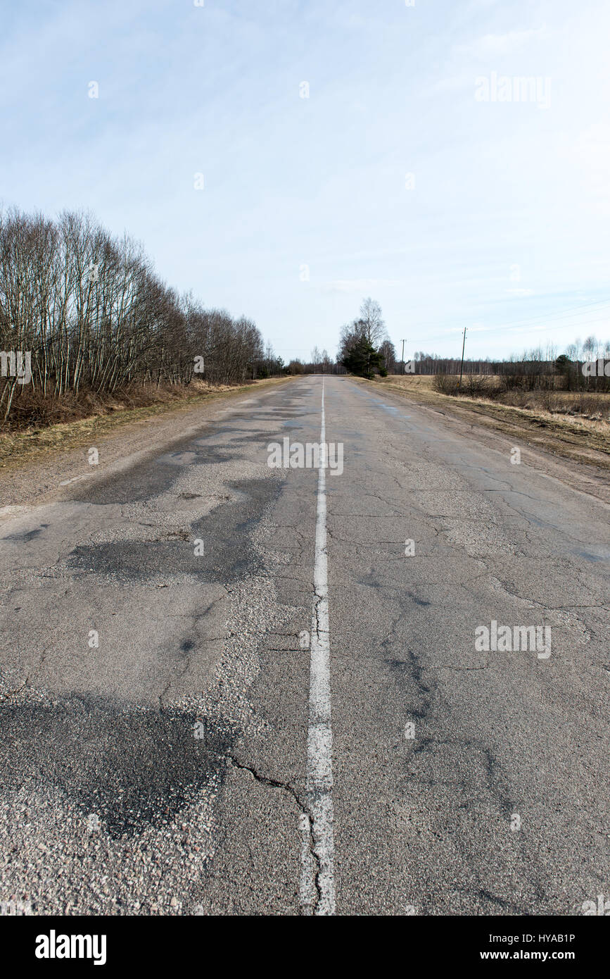 empty country road in spring with perspective and shadows Stock Photo ...