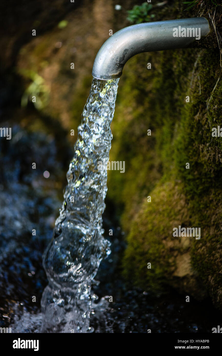 Waterfall splashes in closeup. abstract texture of water with bubbles ...