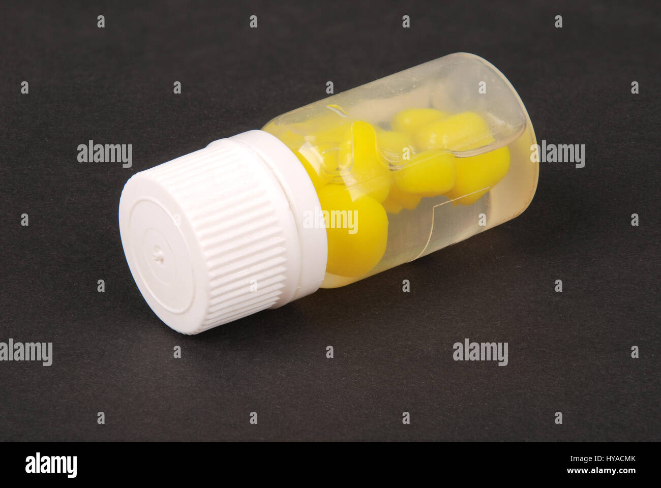 Close up synthetic yellow corn for fishing. Accessories for carp ...