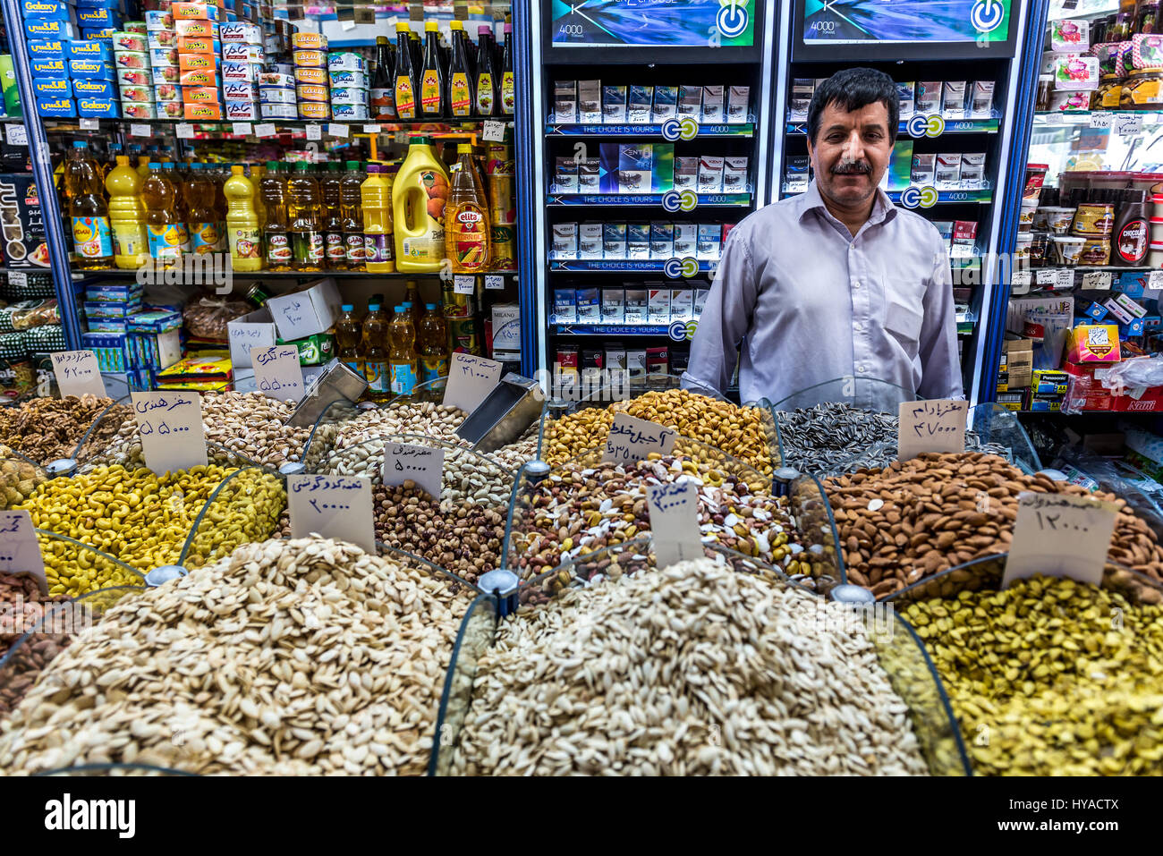 Iranian man in his shop in Isfahan, capital of Isfahan Province in Iran ...