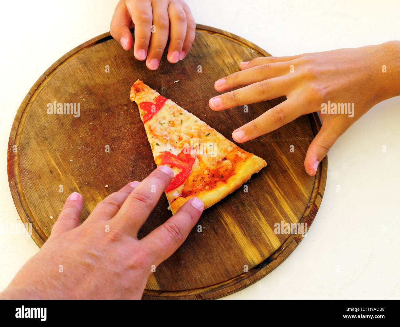 The last piece of pizza Stock Photo - Alamy