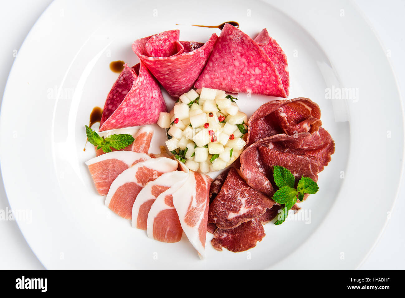 Dish of various types of meat-cutting on plate Stock Photo - Alamy