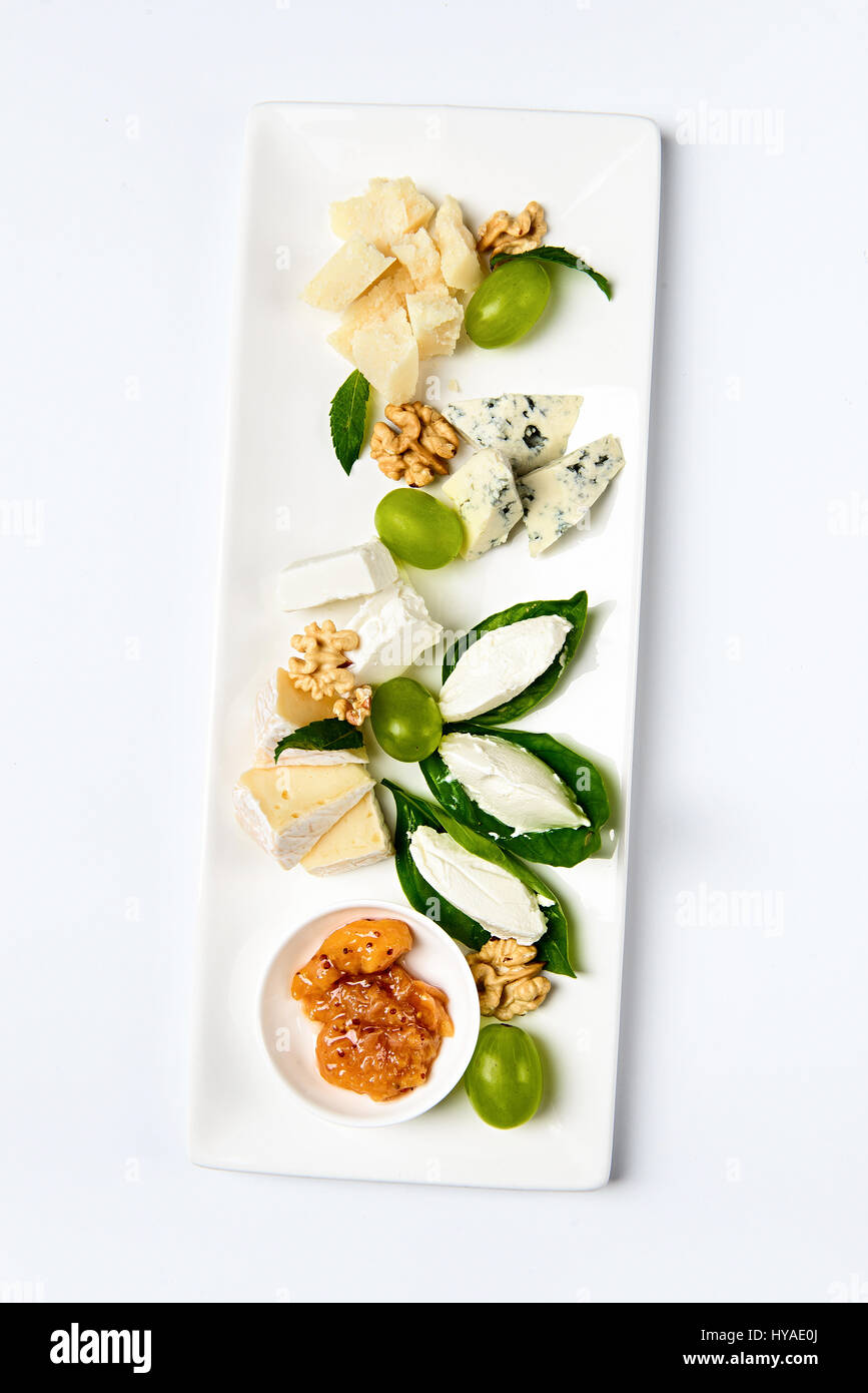 Various cheese type dish served luxery, isolated Stock Photo - Alamy