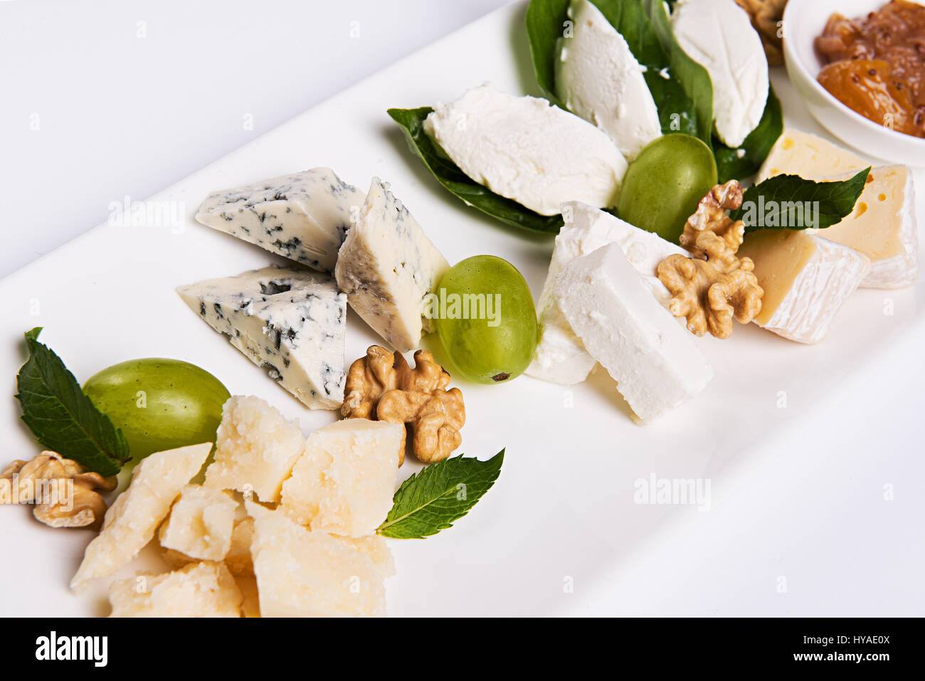 Various cheese type dish served luxery, isolated Stock Photo - Alamy