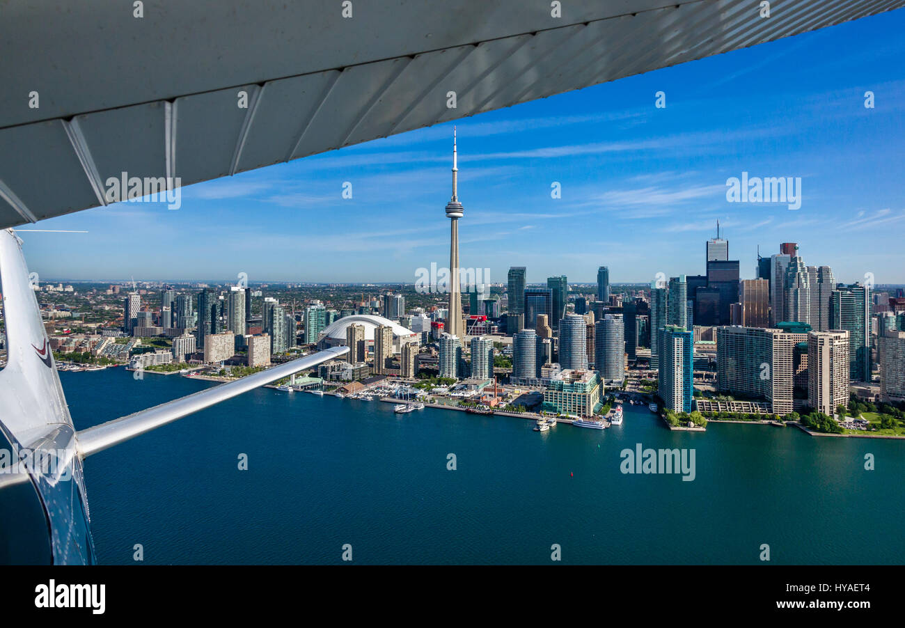 A view of the Toronto city skyline, showing exterior of airplane, after ...