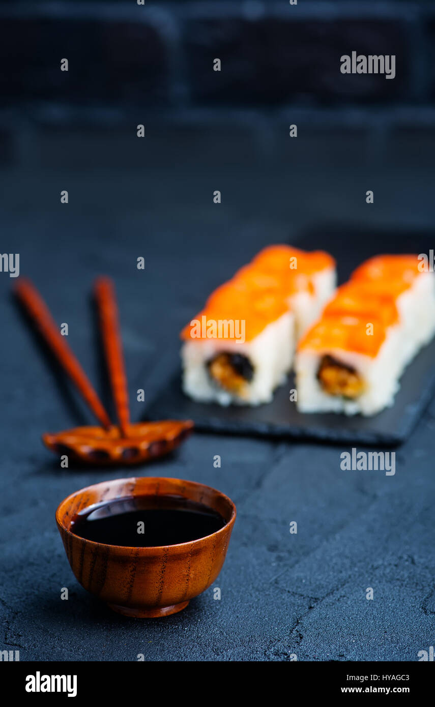 sushi with fresh fresh fish on the board Stock Photo - Alamy