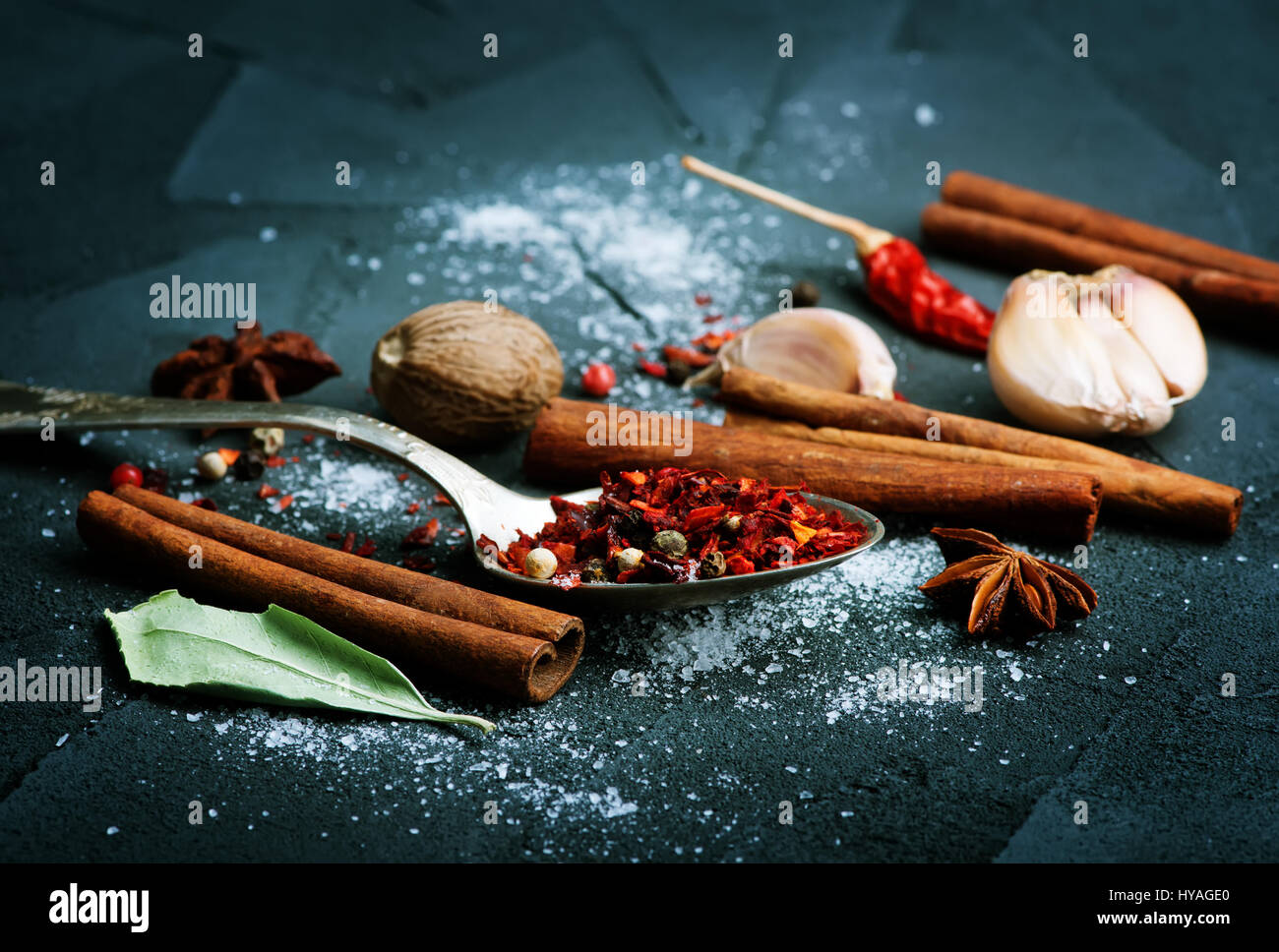 aroma spice in spoon and on a table Stock Photo - Alamy