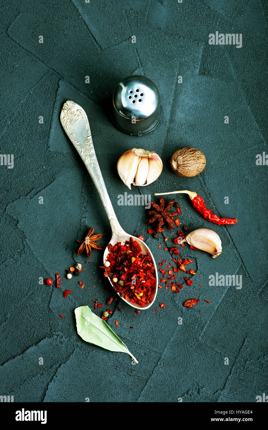 aroma spice in spoon and on a table Stock Photo - Alamy