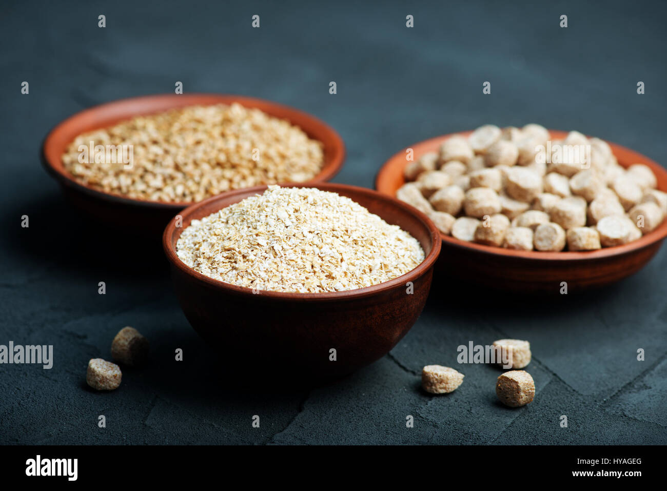 wheat bran in bowls and on a table Stock Photo - Alamy