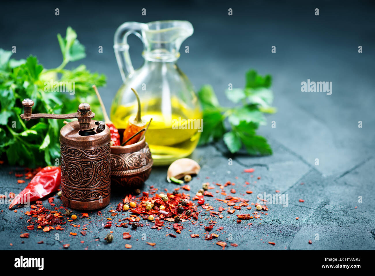 spice and aroma oil on the kitchen table Stock Photo - Alamy