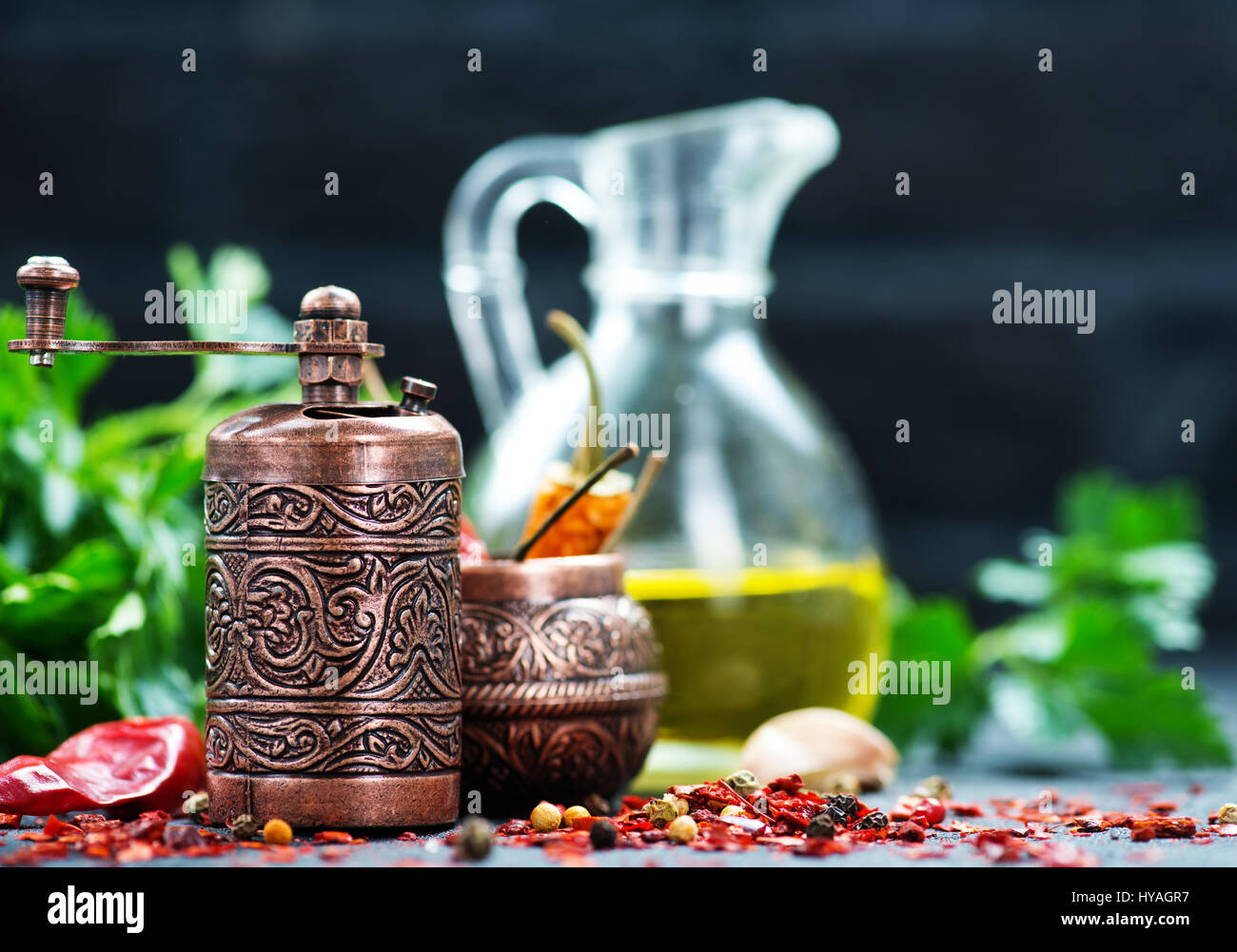 spice and aroma oil on the kitchen table Stock Photo - Alamy