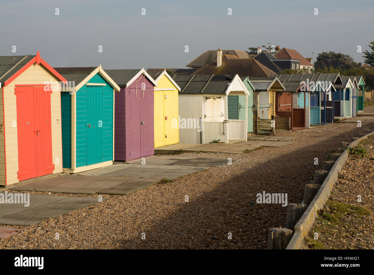 Colourful beach huts on the seafront at Ferring near Worthing, West ...