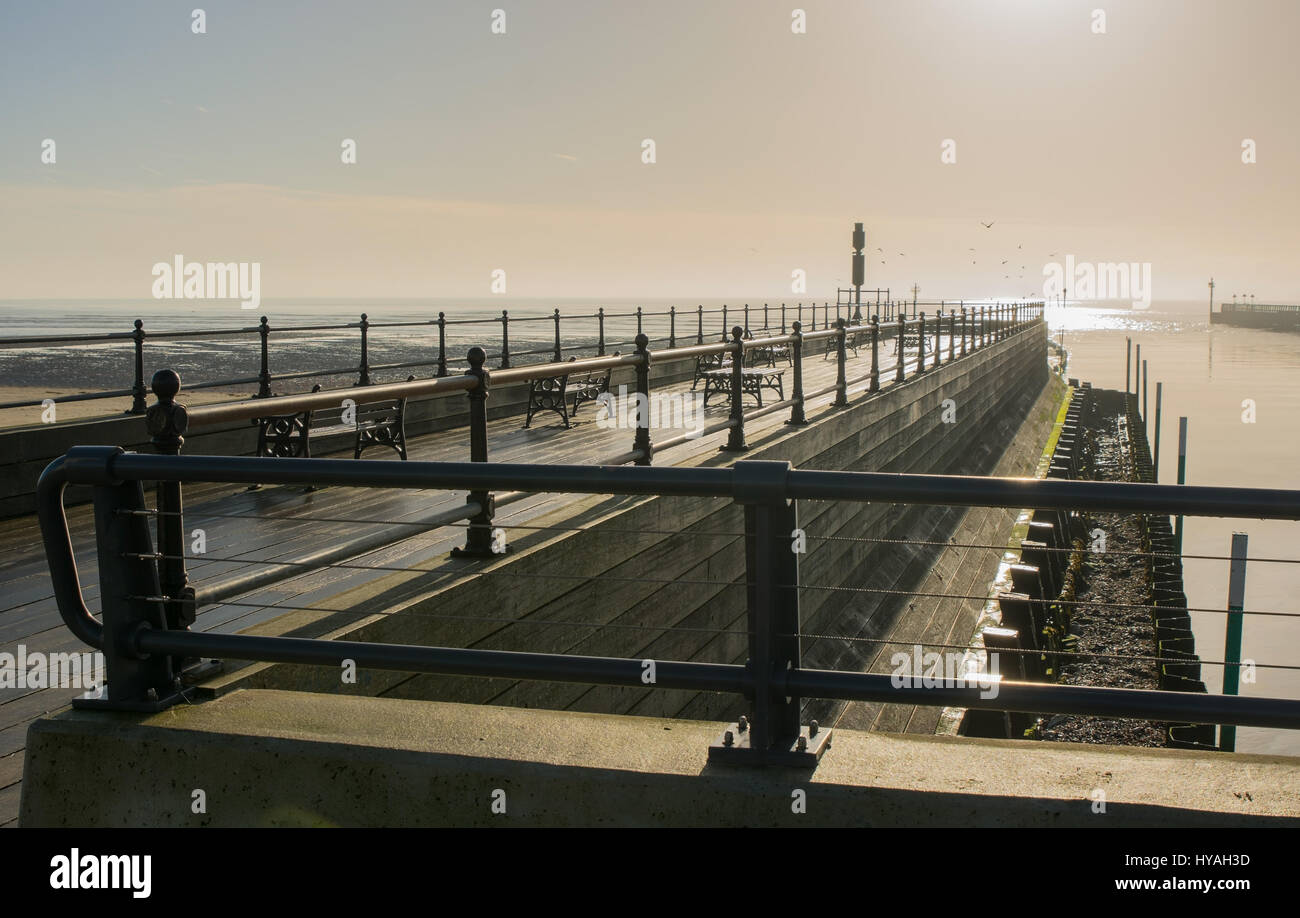 The pier at the entrance to Littlehampton harbour in West Sussex ...
