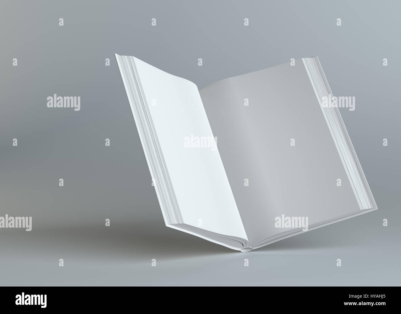 White empty open book on gray background Stock Photo - Alamy