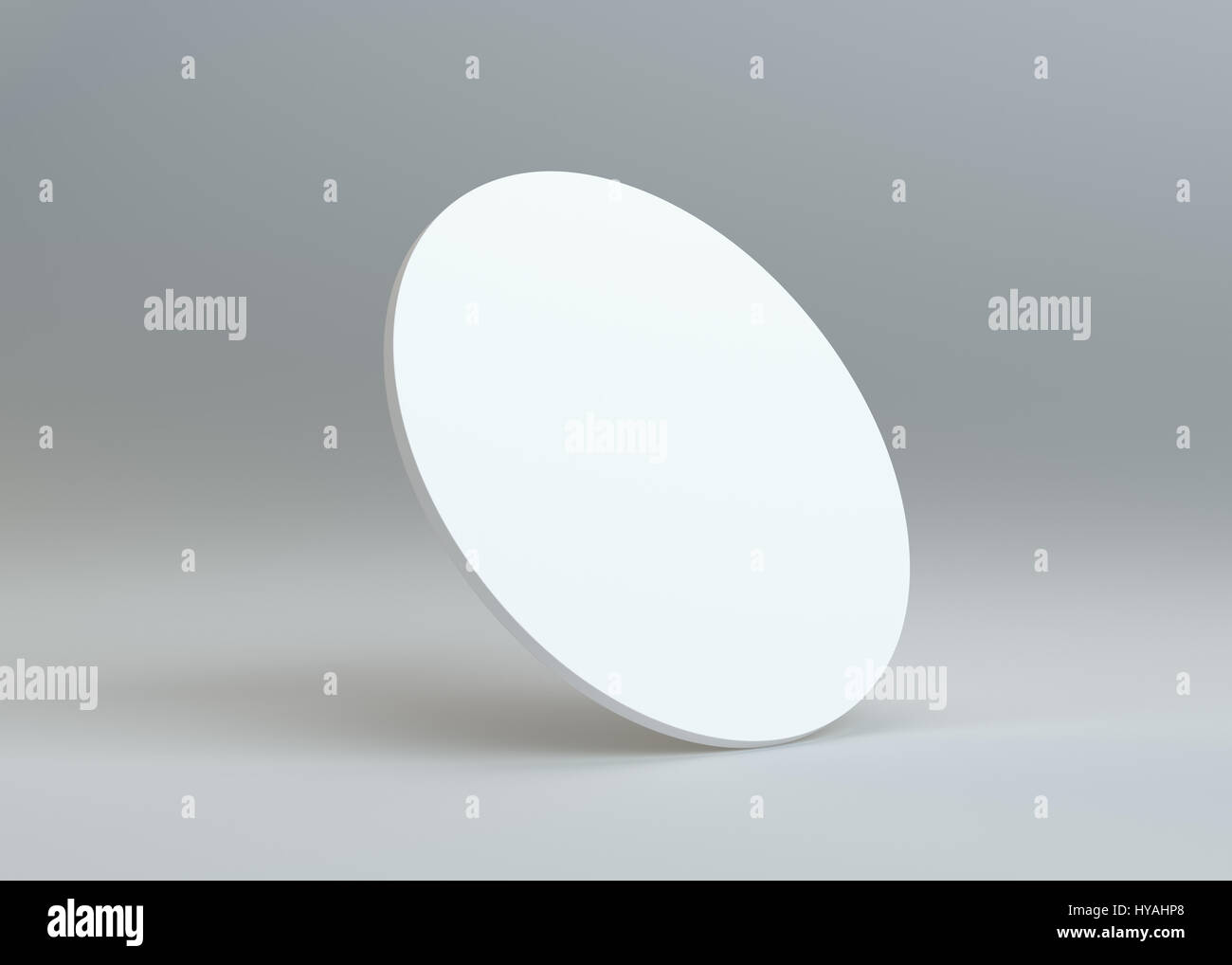 White empty paper disk on gray background Stock Photo - Alamy