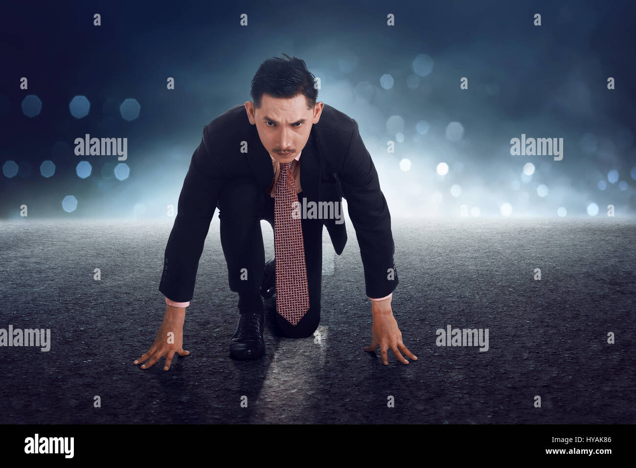 Suit businessman race track hi-res stock photography and images - Alamy