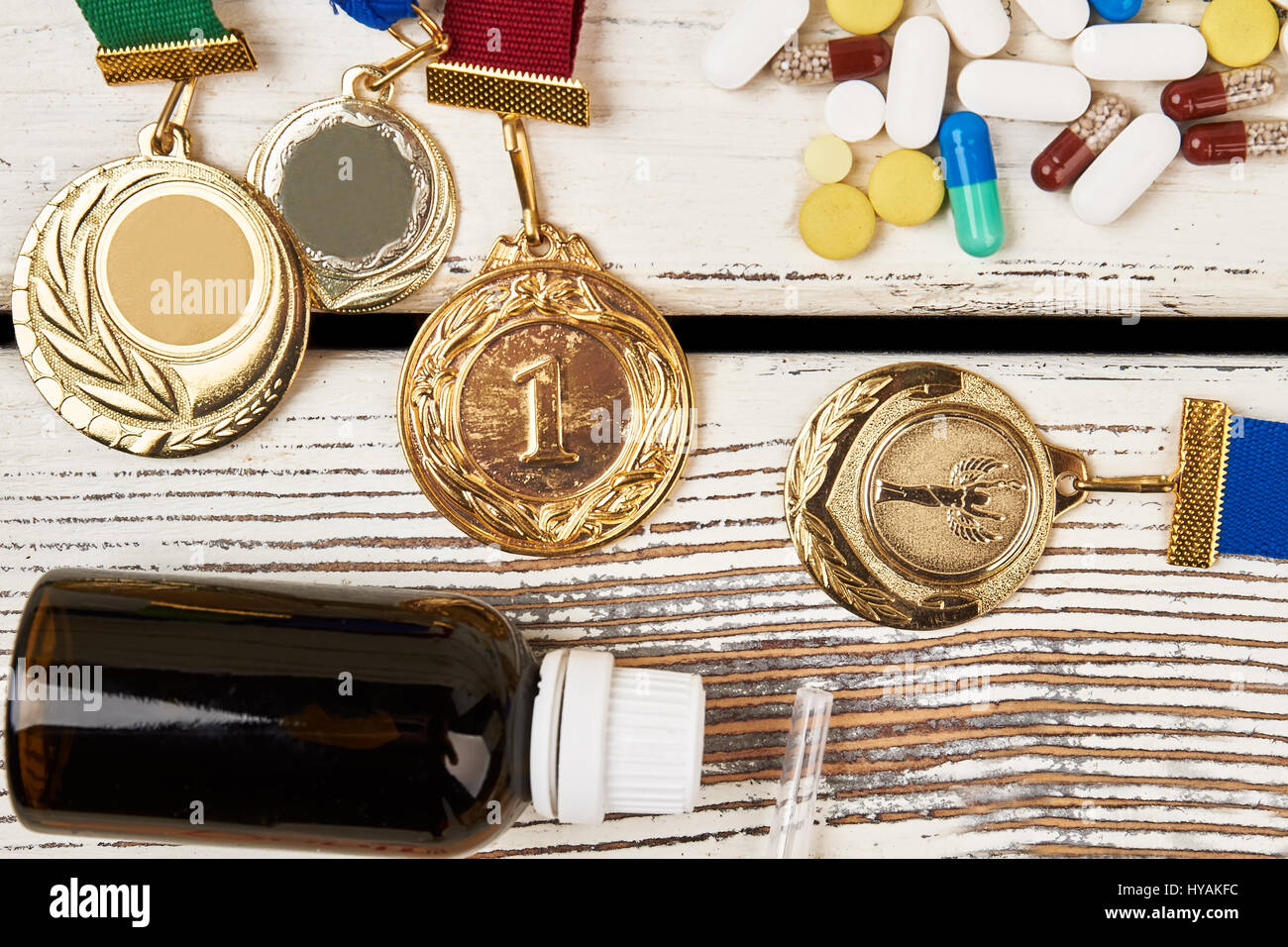 Medals, pills and bottle Stock Photo - Alamy