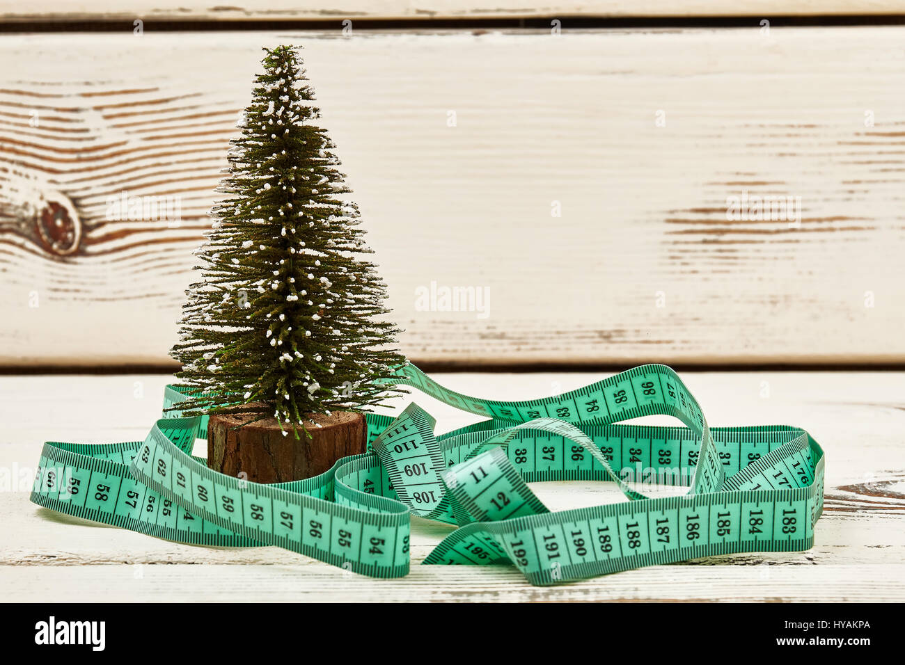 Christmas tree and measuring tape Stock Photo - Alamy