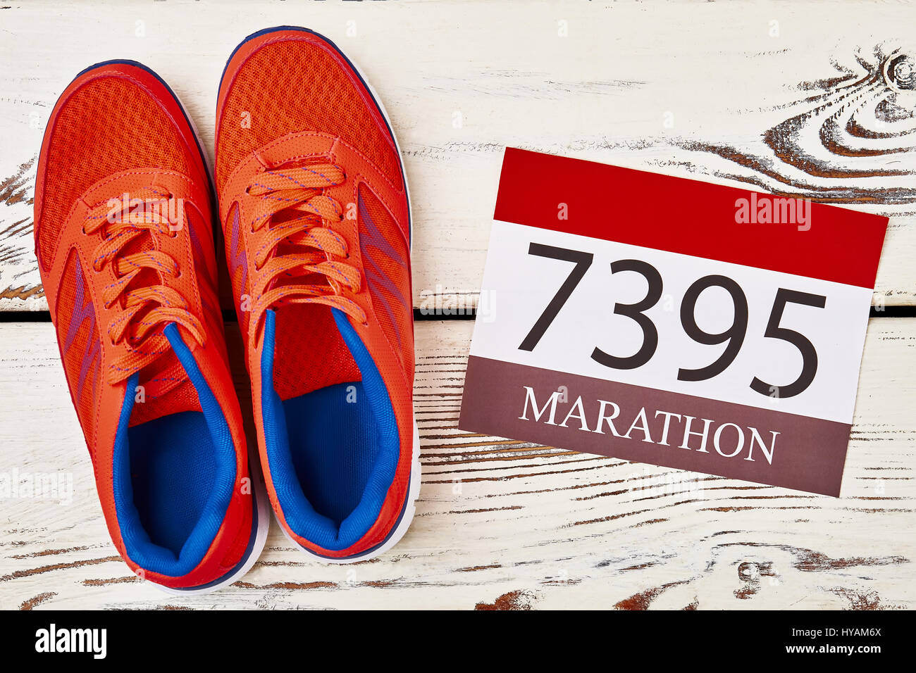 Sneakers and participant number Stock Photo - Alamy