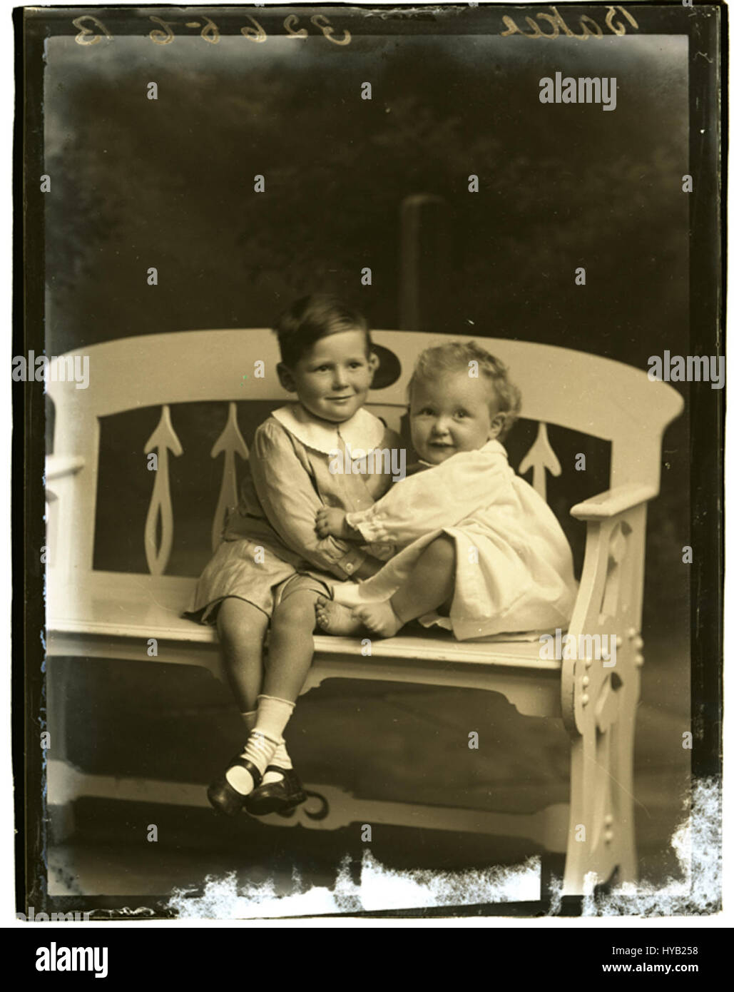 This photograph captures a group of children, identified as the Baker ...