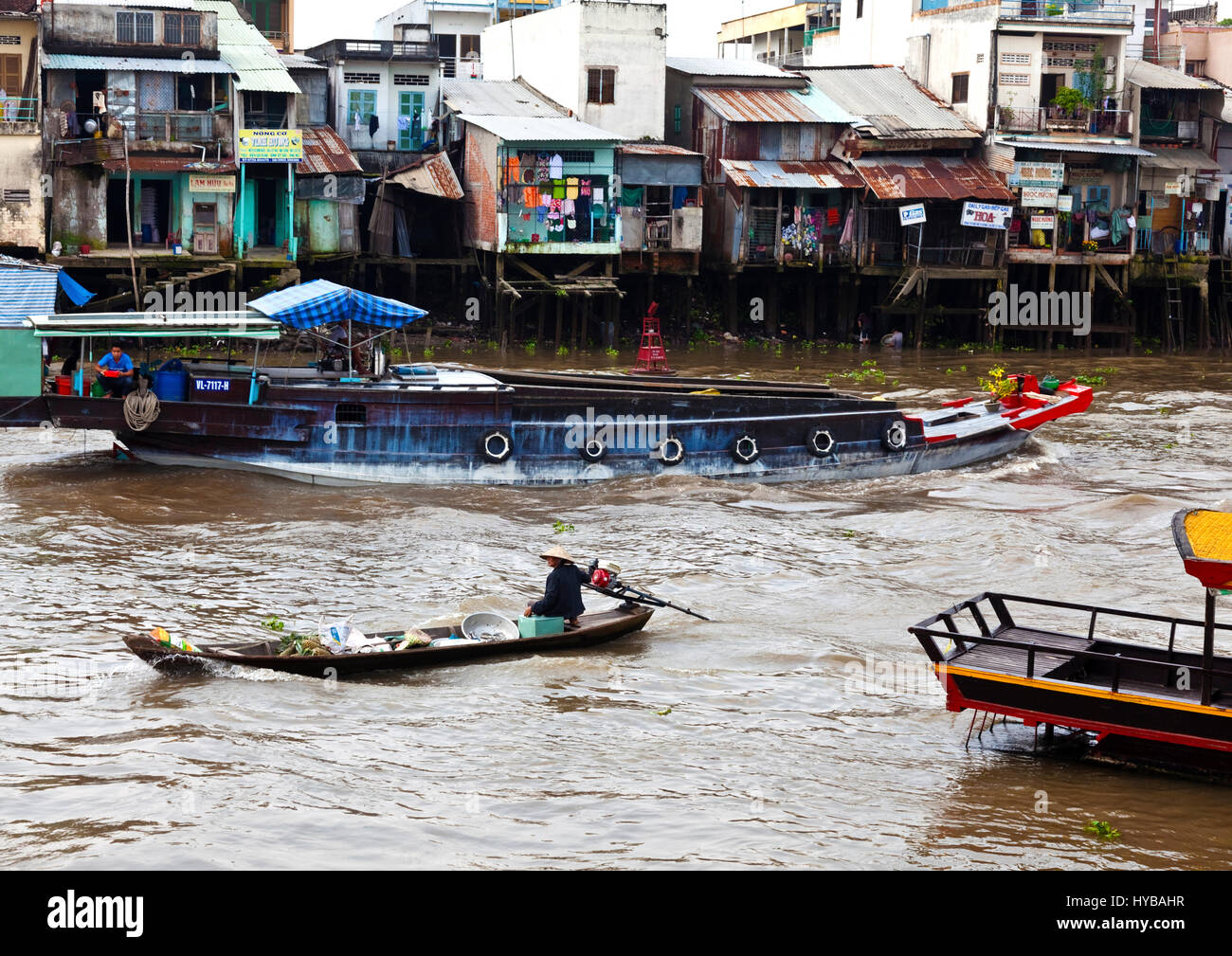 Busy scene on Upper Mekong River in Vietnam Stock Photo - Alamy