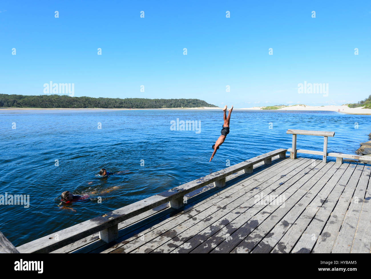 Kids jumping into water hi-res stock photography and images - Alamy