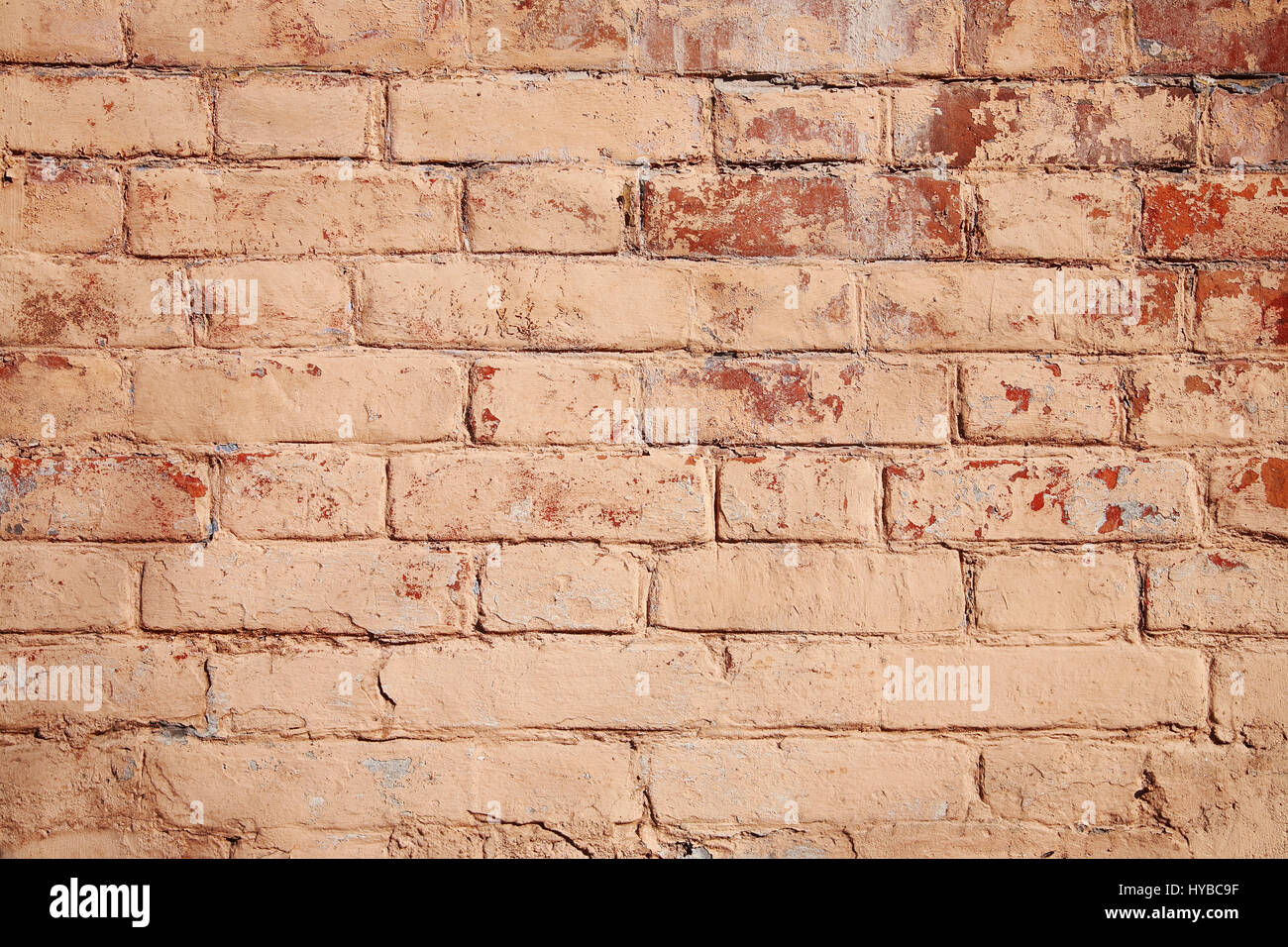 Old painted, scratched brick wall, red Stock Photo - Alamy