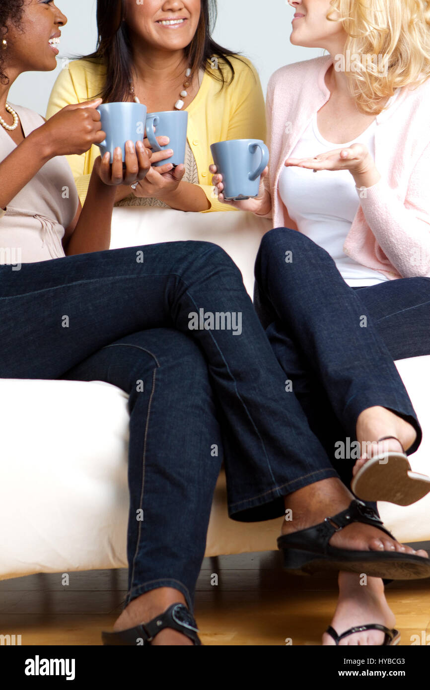 Diverse group of friends talking and laughing Stock Photo - Alamy