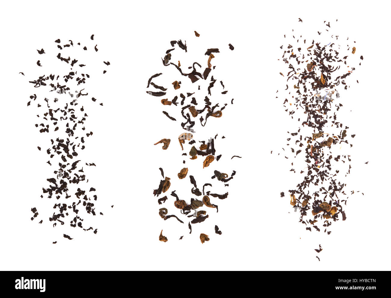 Falling dried tea leaves isolated on white background Stock Photo - Alamy