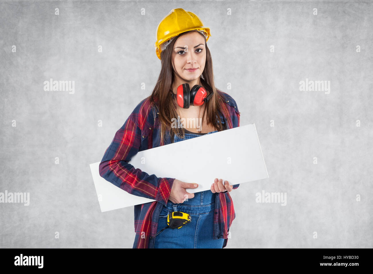 Woman worker with advertising banner Stock Photo - Alamy