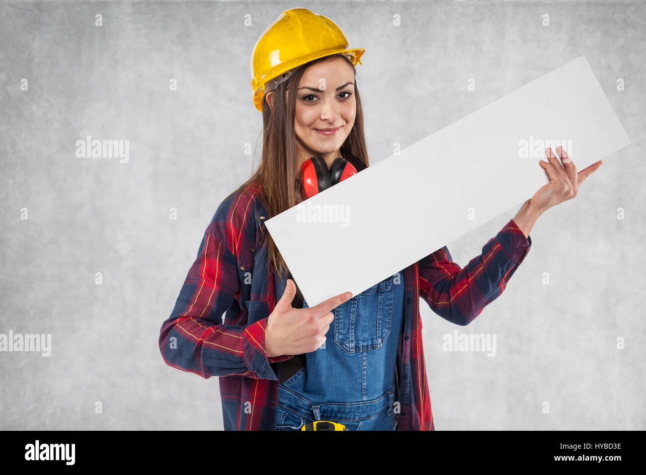 Female worker holding board hi-res stock photography and images - Alamy