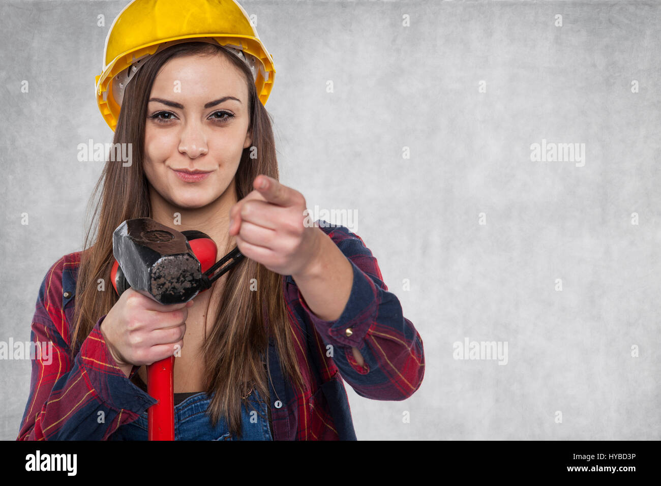 Female construction worker pointing at you Stock Photo - Alamy
