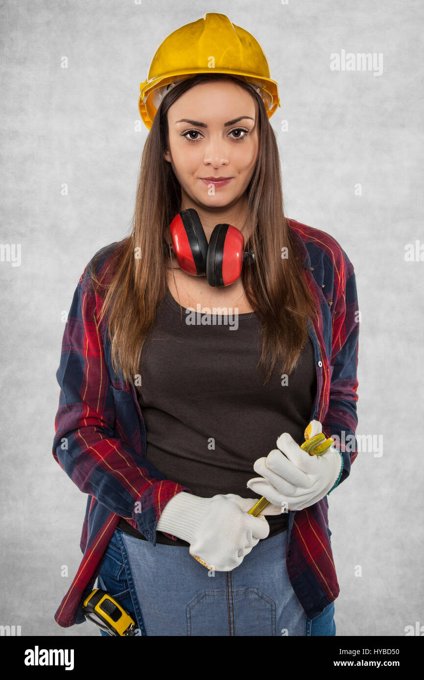Female construction worker, working as plumber Stock Photo - Alamy