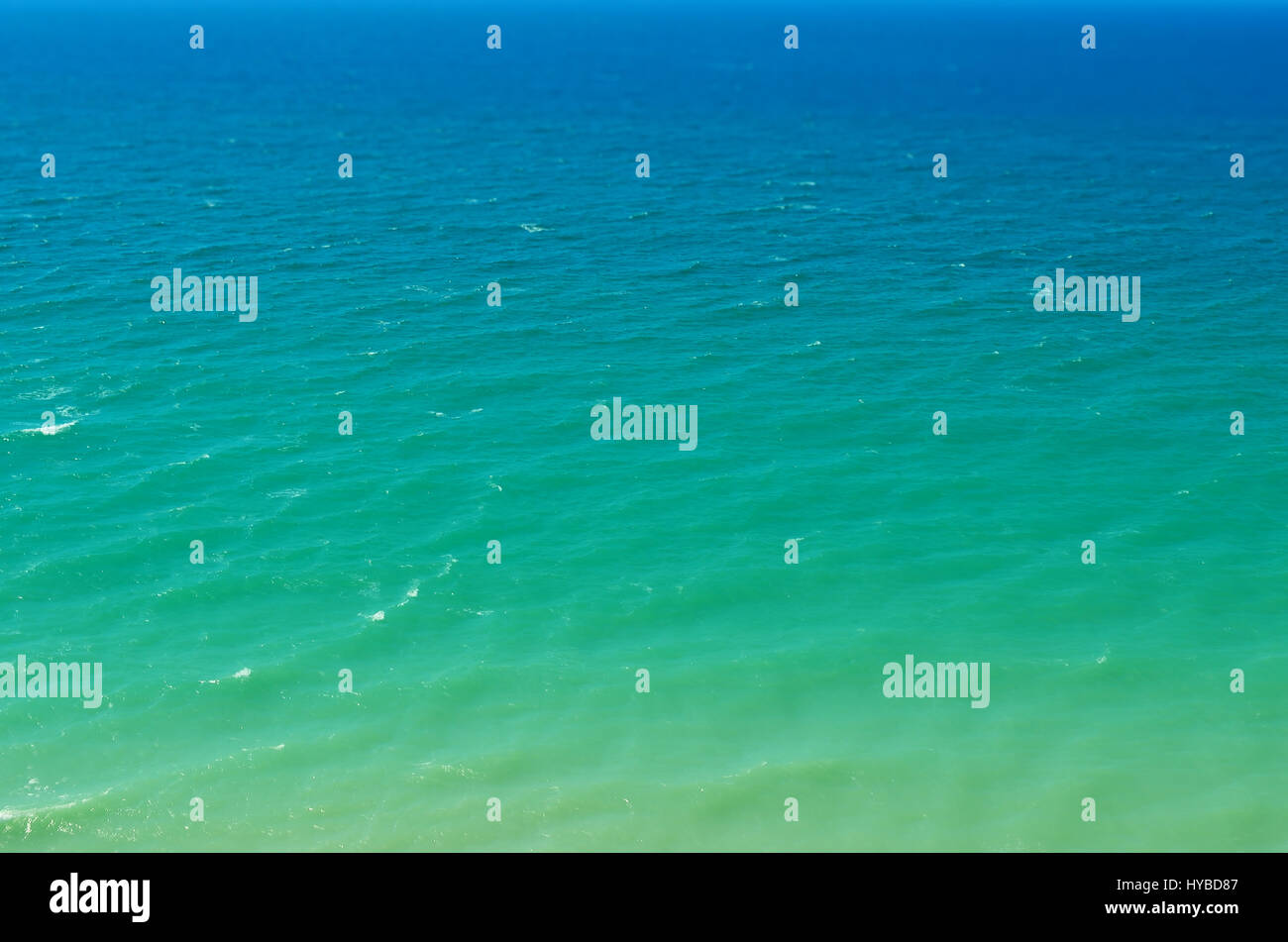 The sea changes colors depending on the depth Stock Photo - Alamy