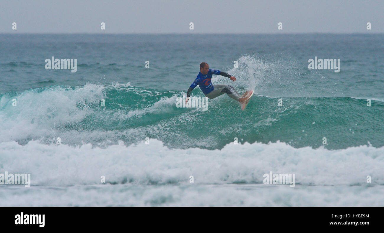 Surfer floating over big wave Stock Photo - Alamy