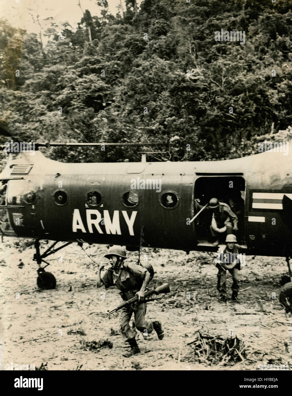 US Commando soldiers getting out of an helicopter, Vietnam Stock Photo ...