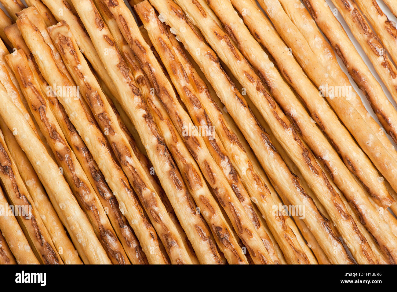 Long thin biscuit sticks background Stock Photo - Alamy