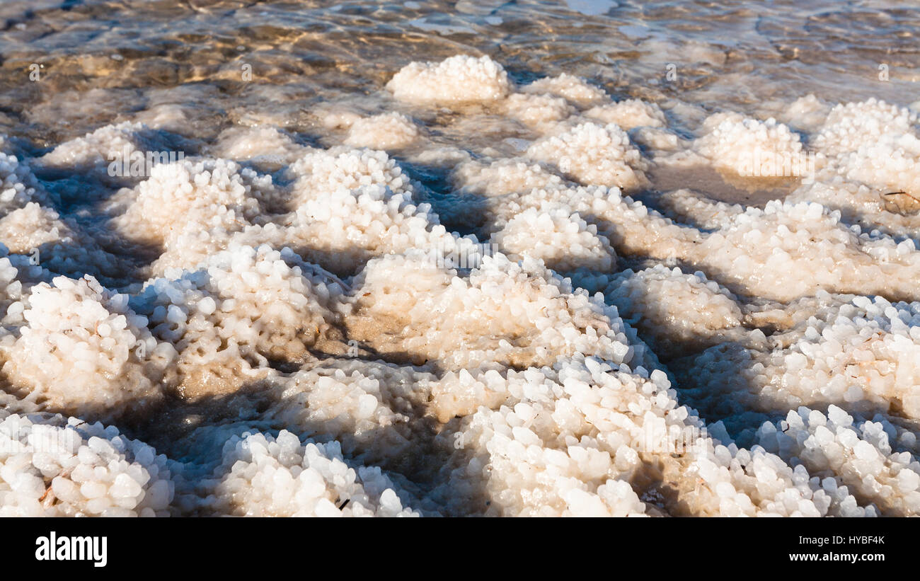 Travel to Middle East country Kingdom of Jordan - sea salt on beach of ...