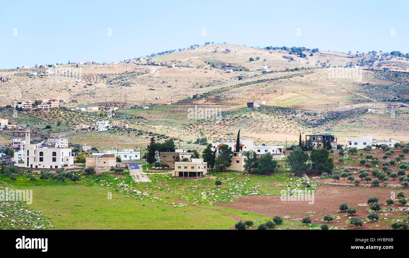 Travel to Middle East country Kingdom of Jordan - view of village and ...