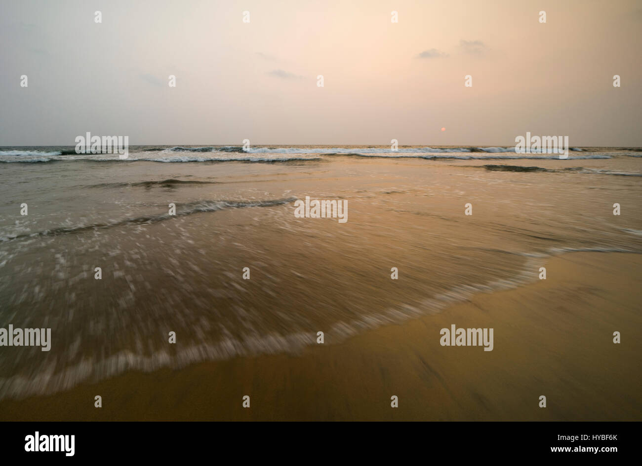 Varkala beach sunset Stock Photo - Alamy