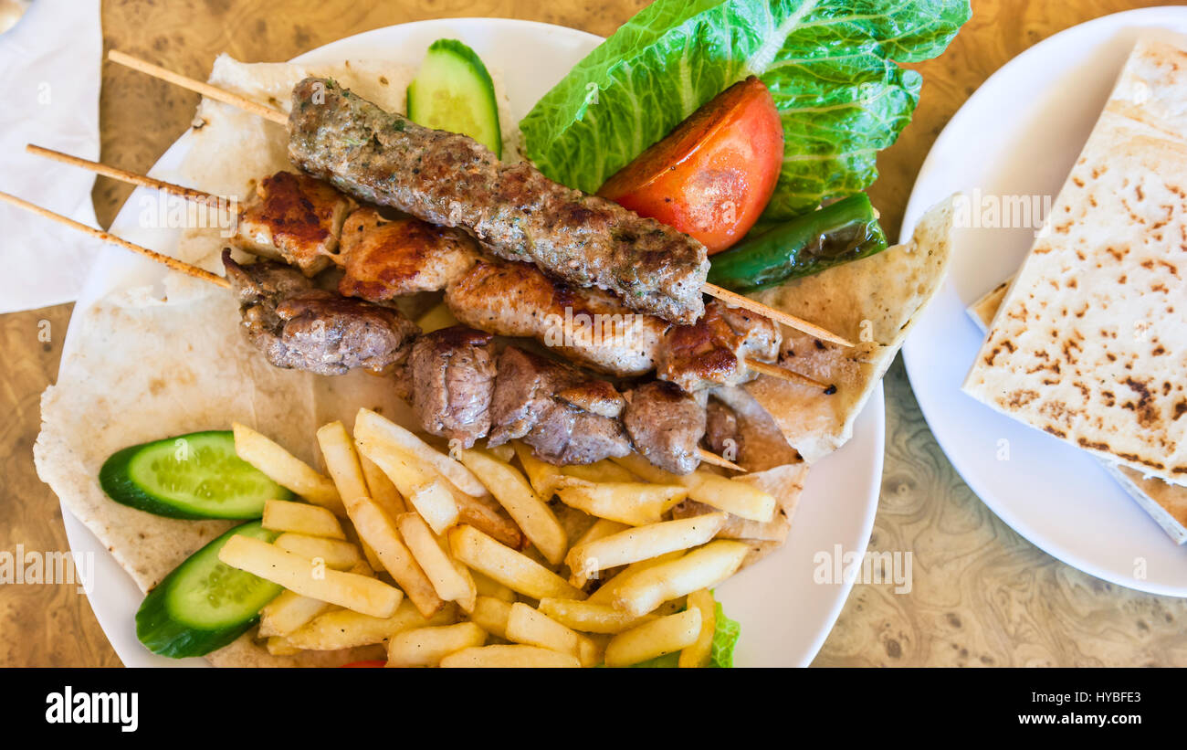 Travel to Middle East country Kingdom of Jordan - above view of skewers ...