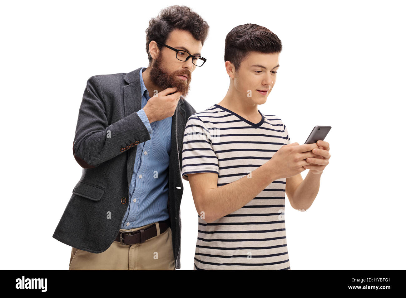 Concerned father looking at the phone of his teenage son isolated on ...